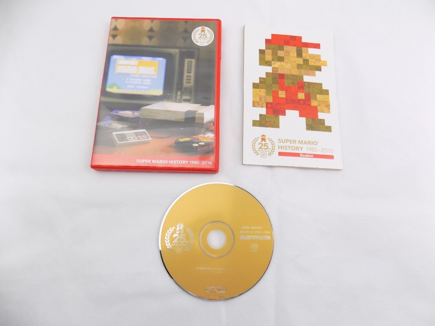 Super Mario History 1985-2010 25th Anniversary Collector's Item With ...