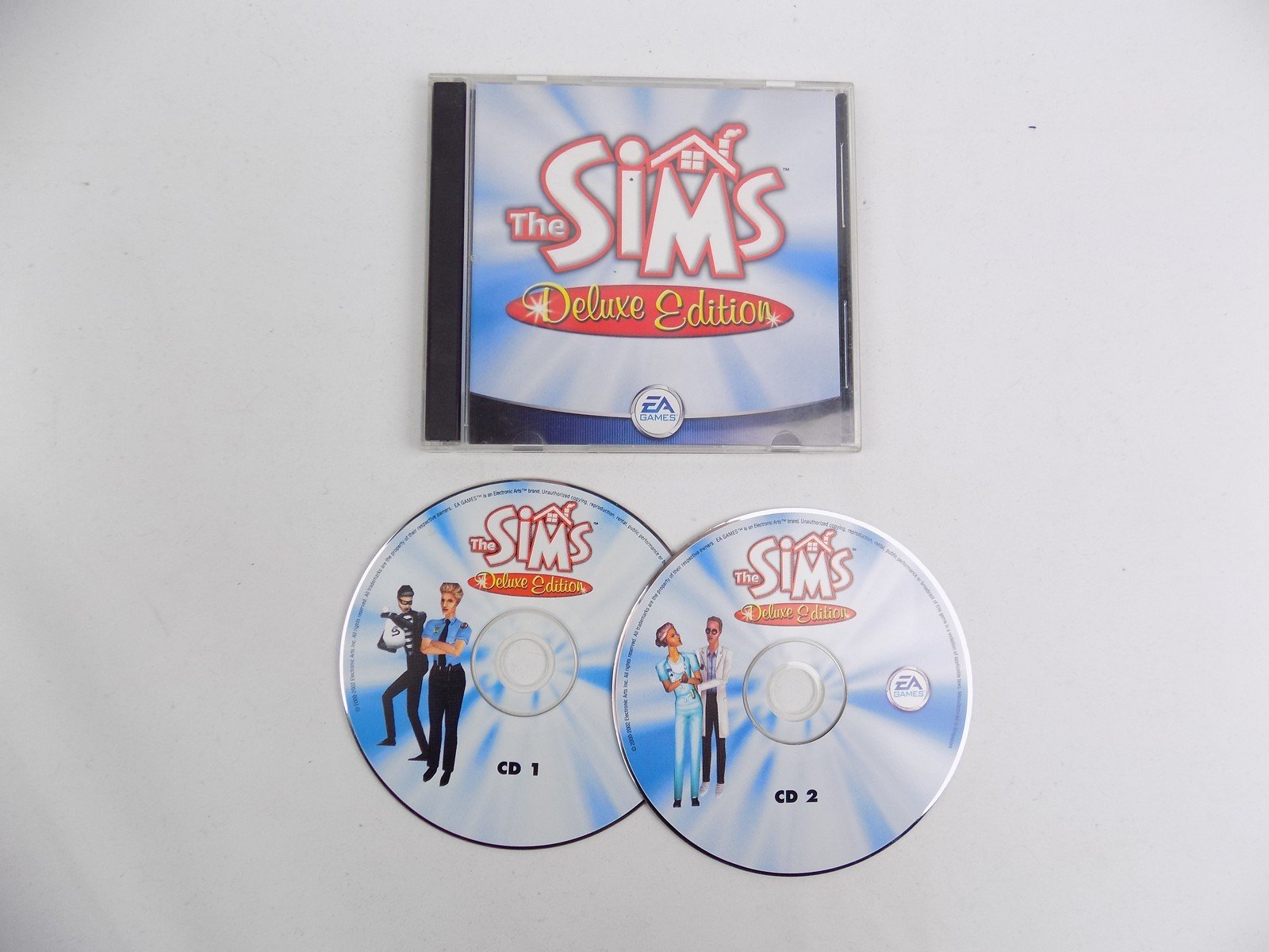 Mint Disc PC The Sims Deluxe Edition Jewel Case - Starboard Games
