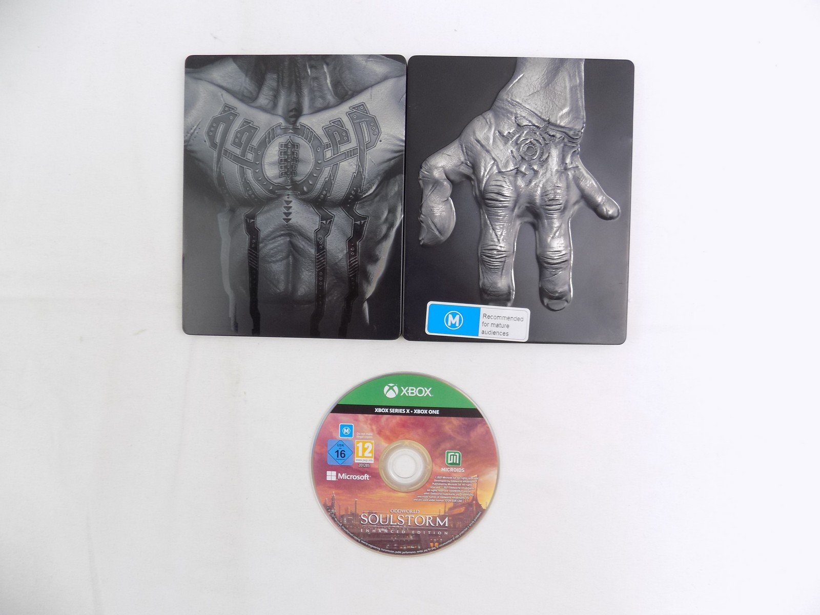 Mint Disc Xbox One Oddworld Soulstorm Steelcase - Starboard Games