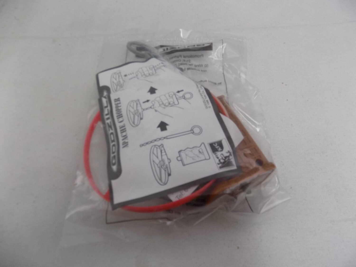 Brand New Sealed KFC Godzilla Apache Chopper - Starboard Games