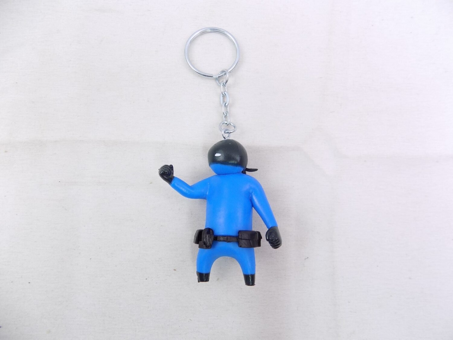 Like New Gang Beasts Blue Vigilante Keychain Figure - Starboard Games